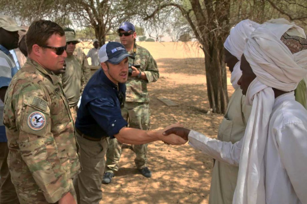Niger-CVJ-soldier-handshake-adj - Spirit of America